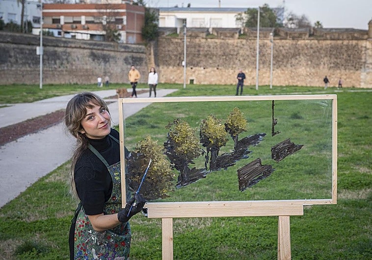 Una obra de arte efímero pone árboles al corredor verde de la calle ...